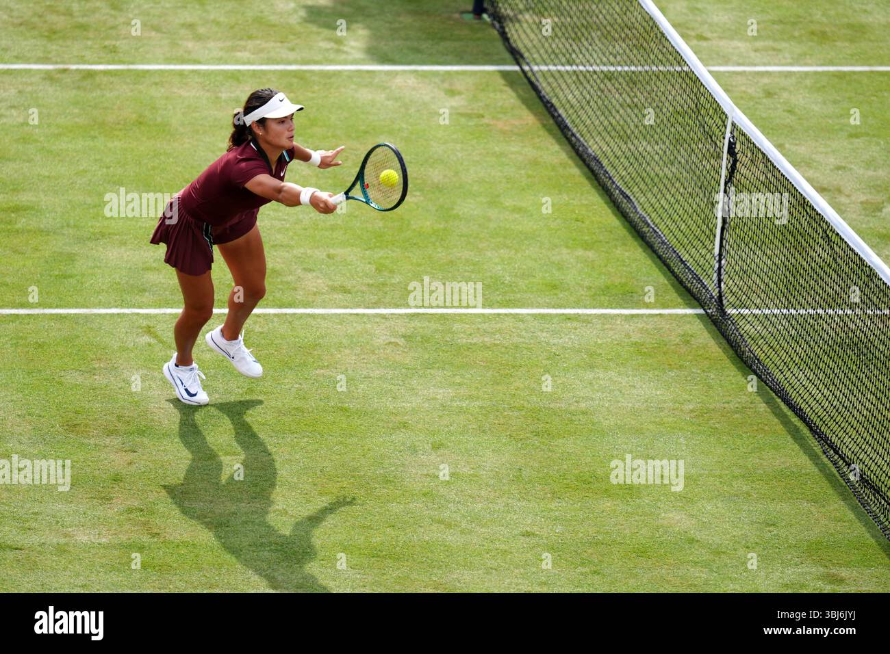 Emma Raducanu in action against Qinwen Zheng on day five of the HSBC Championships at The Queen ...