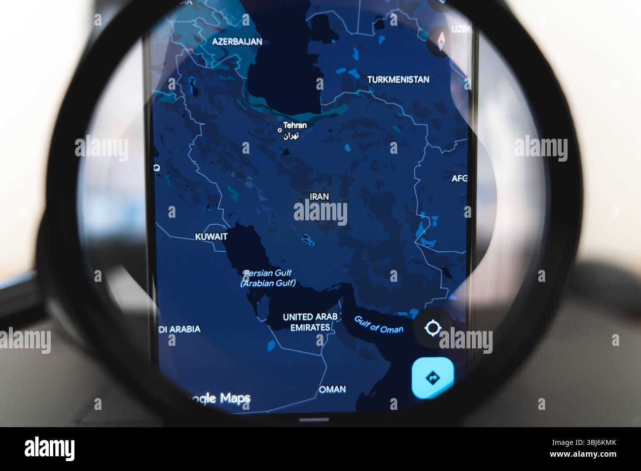 Smartphone screen showing satellite map of Iran a Country in the Middle ...