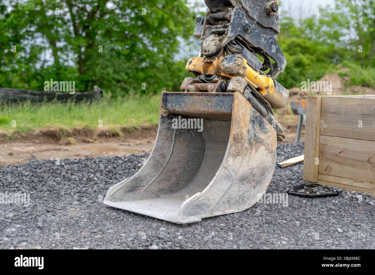 excavator digging equipment on a construction site, hydraulic power ...