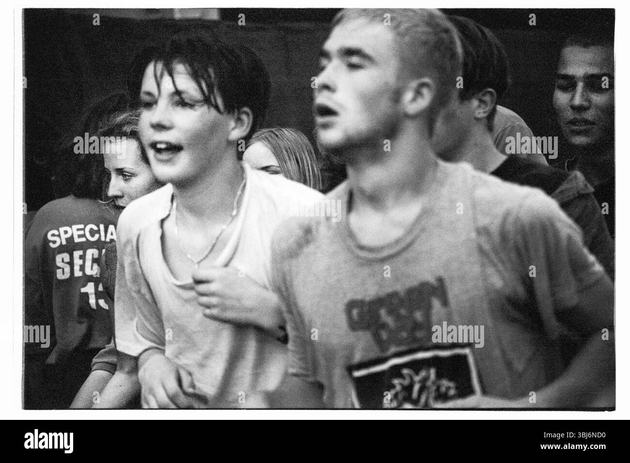 FESTIVAL PIT, NME STAGE, WEEZER, 1995: Security work hard in the pit at the second NME Stage ...
