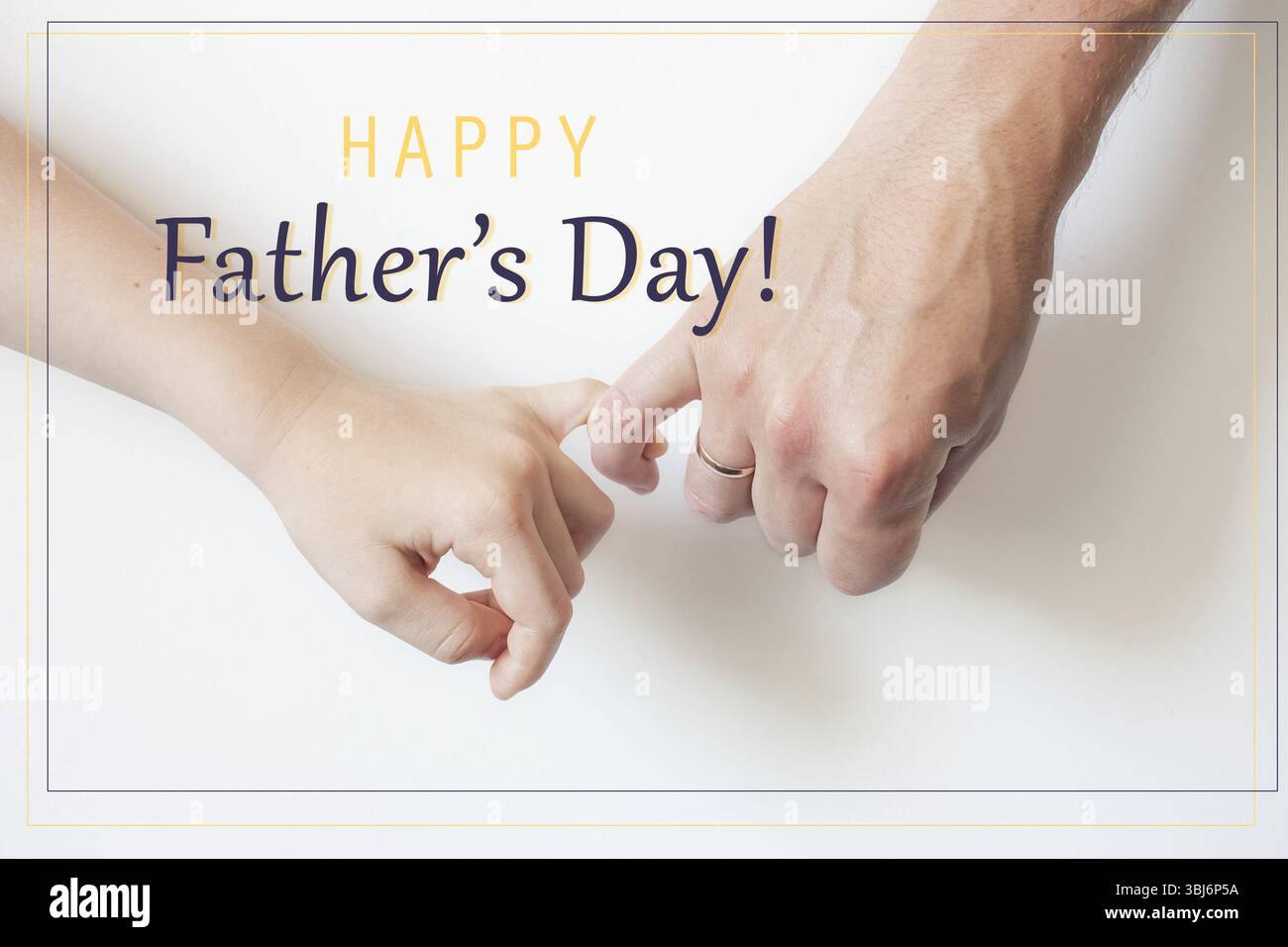 Happy father's day. The image shows a touching moment between father and child, gently linking ...