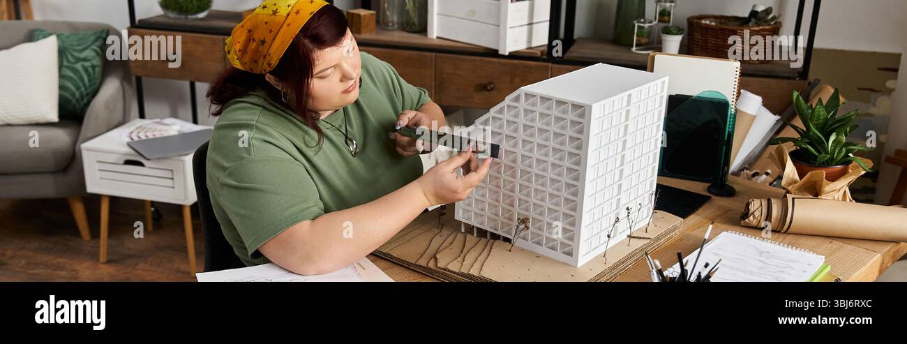 An artist attentively creates a detailed piece, displaying her vibrant ...