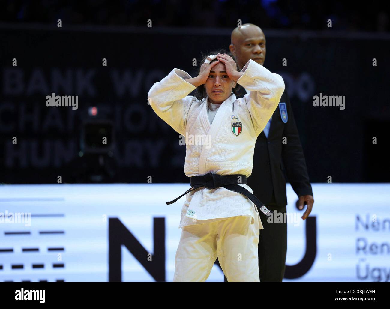 Assunta SCUTTO (white) of Italy reacts after the final match against ...
