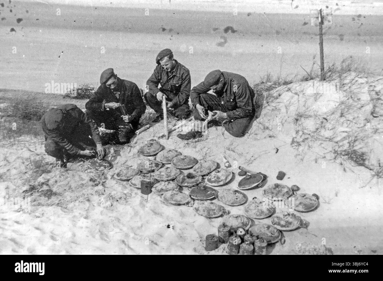 WW2 German anti-tank Teller mines and S-mines cleared in the dunes at ...