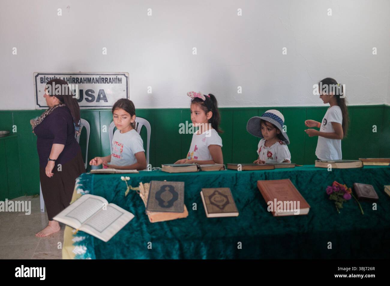 June 23, 2024, Hatay, Turkey: Children praying at the grave of an Arab ...