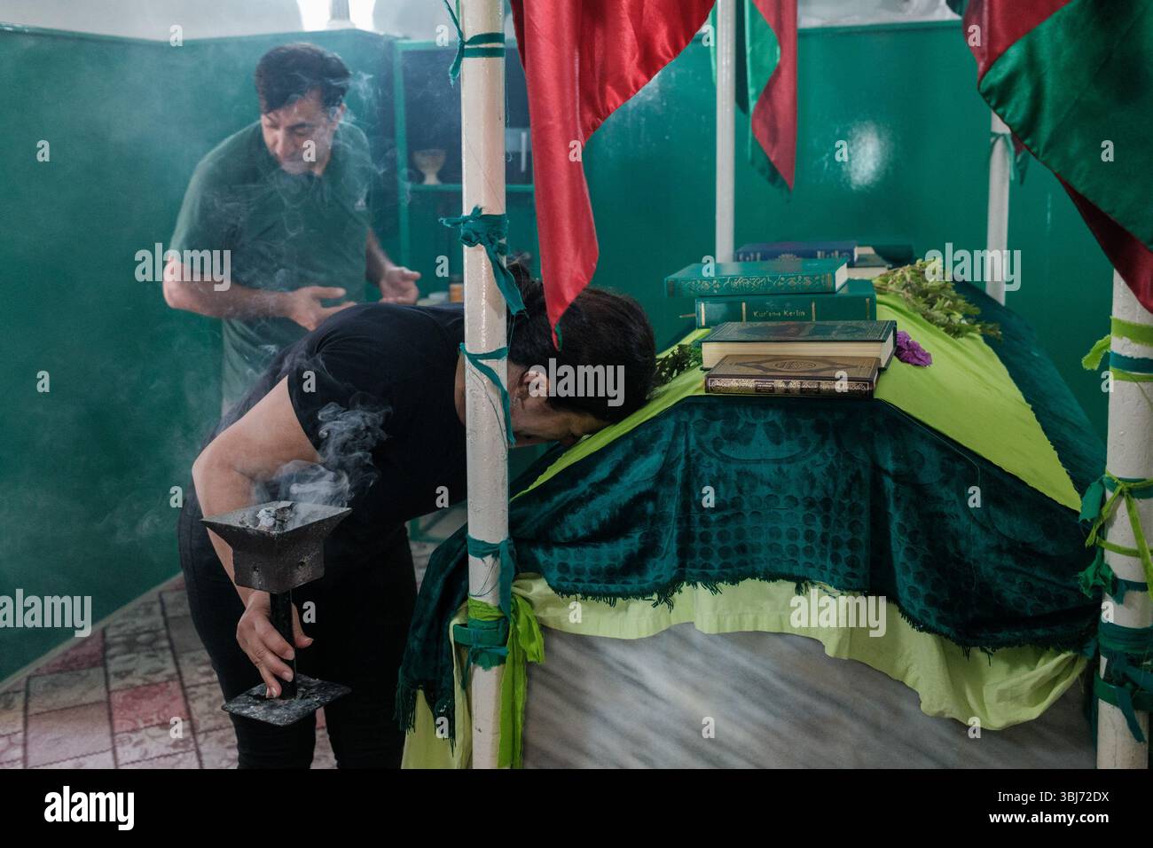 June 23, 2024, Hatay, Turkey: A woman kissing the grave of an Arab ...
