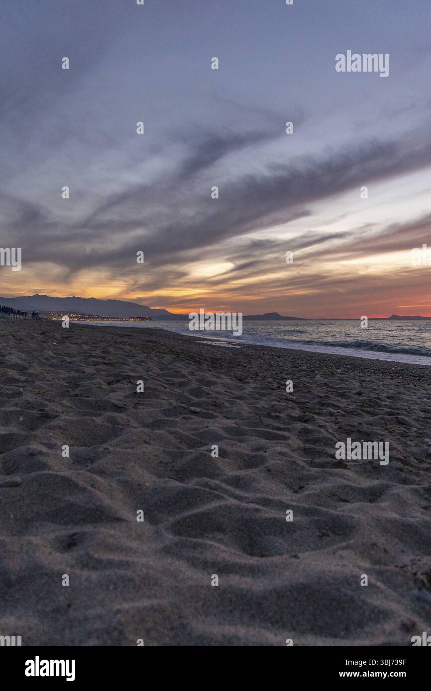 Beautiful coastline with a sandy beach and pebble beach at sunset ...