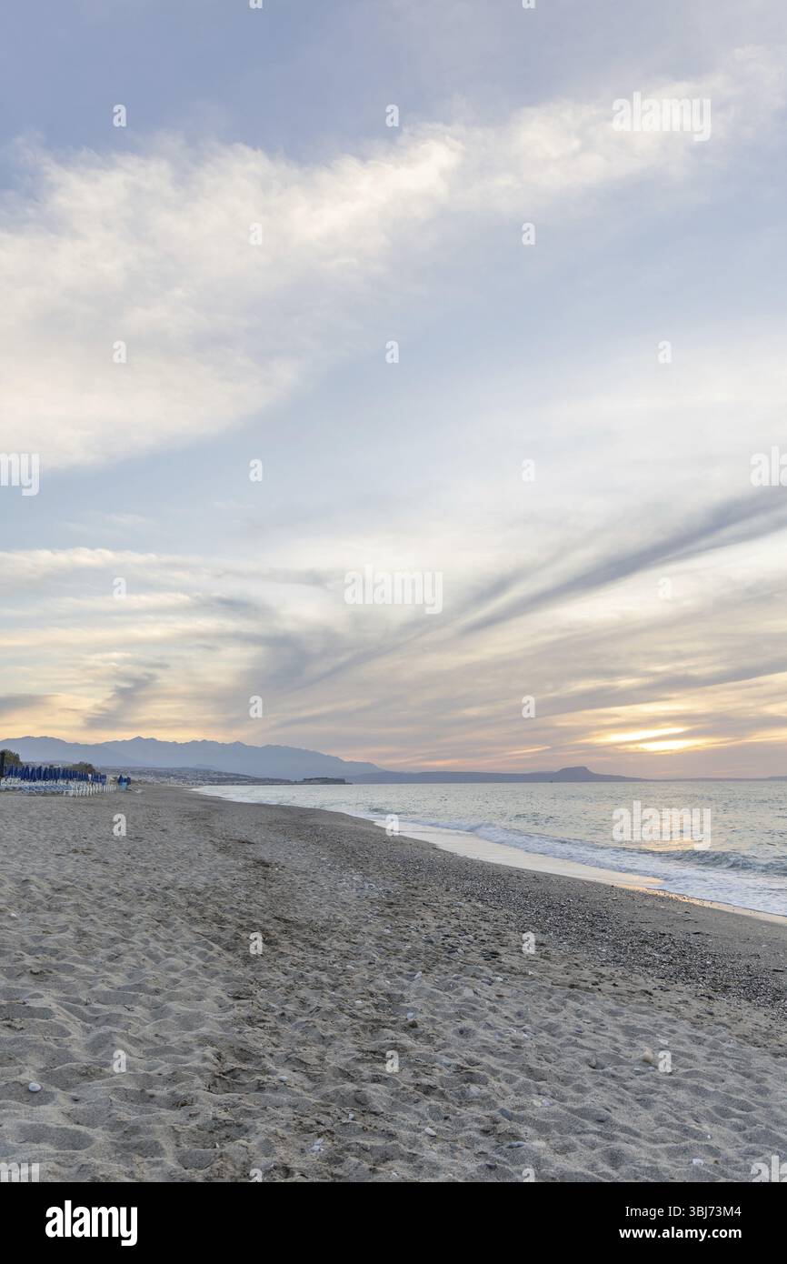 Beautiful coastline with a sandy beach and pebble beach at sunset ...