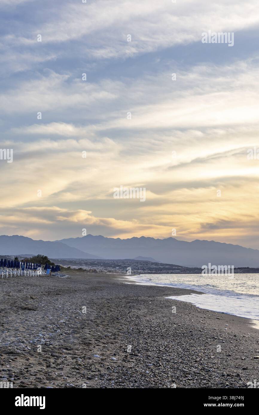 Beautiful coastline with a sandy beach and pebble beach at sunset ...