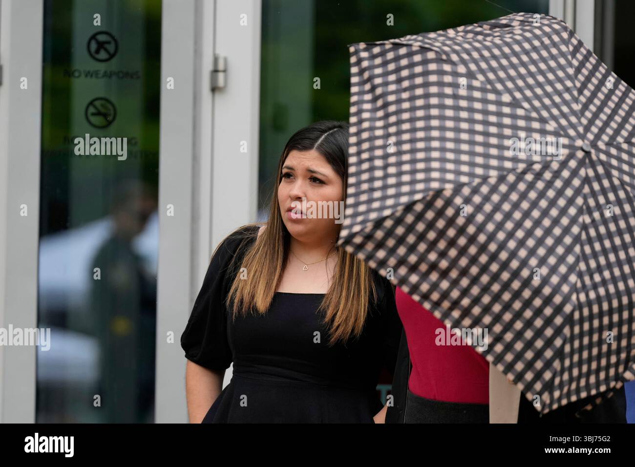 Jennifer Vasquez Sura, wife of Kilmar Abrego Garcia, walks out of the ...