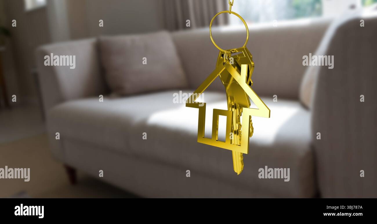 Dangling golden house-shaped keyring holding metal keys in living room ...
