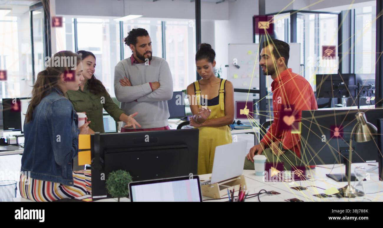 Team collaborating around desk in hi-res stock photography and images ...