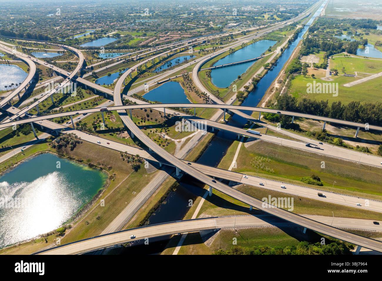 Complex highway overpass elevated direction lanes with busy traffic in ...