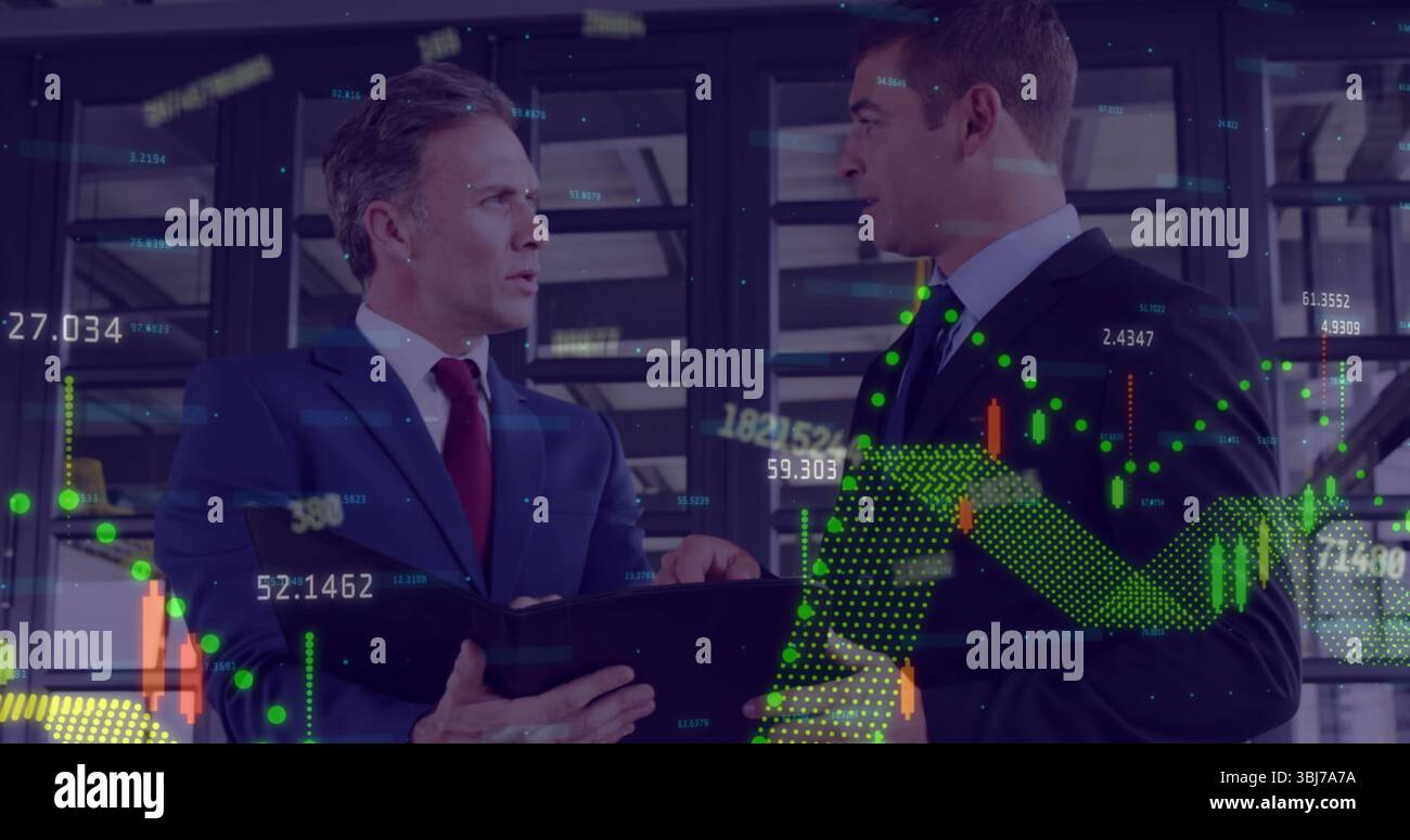 Reviewing two men in suits using digital tablet in server room, with ...