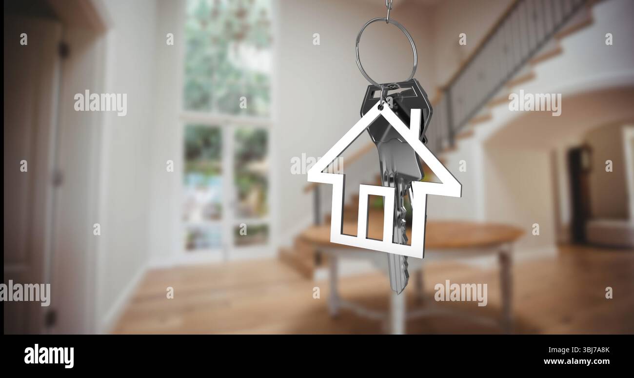 Dangling metallic key ring with house-shaped key fob and keys in entry ...