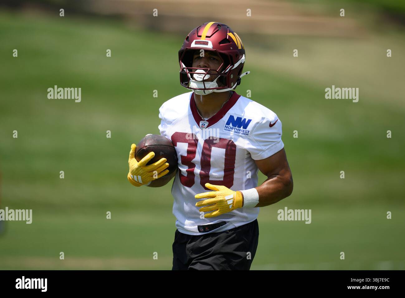 Washington Commanders running back Austin Ekeler (30) works out during ...