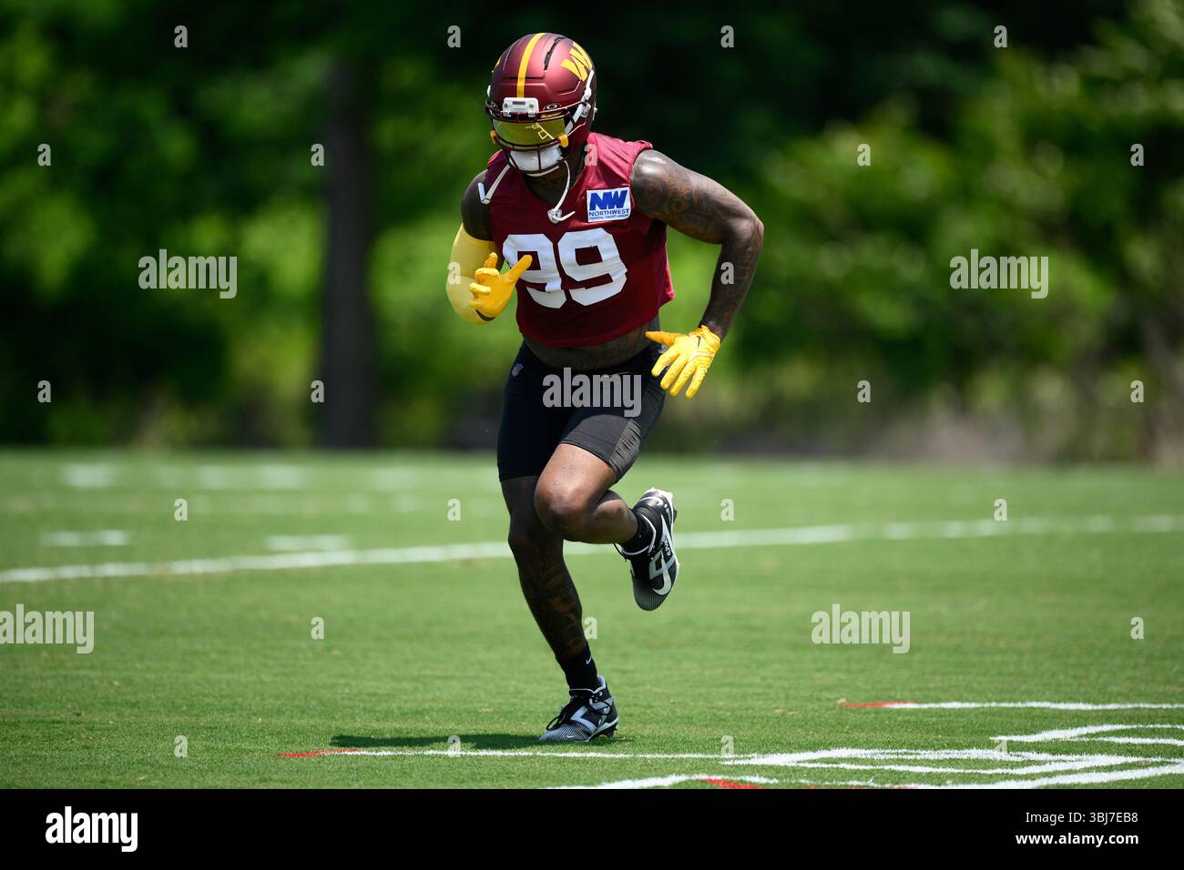 Washington Commanders defensive end Clelin Ferrell (99) works out ...