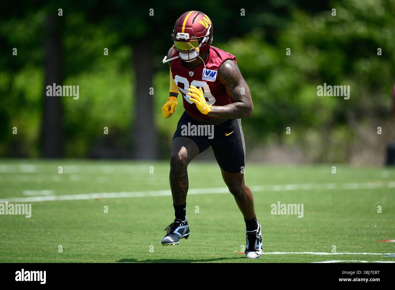 Washington Commanders defensive end Clelin Ferrell (99) works out ...