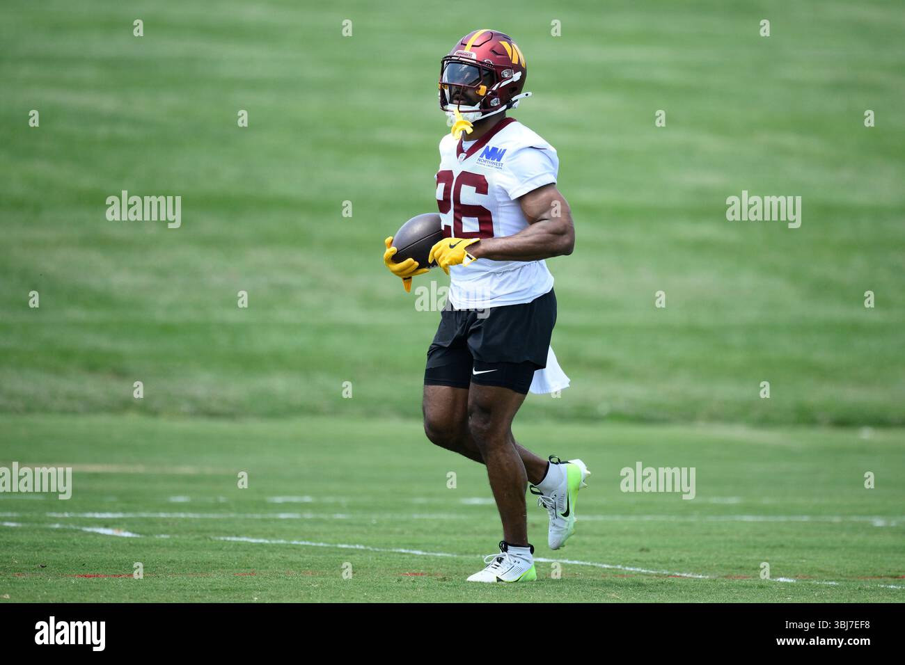 Washington Commanders running back Jeremy McNichols (26) works out ...