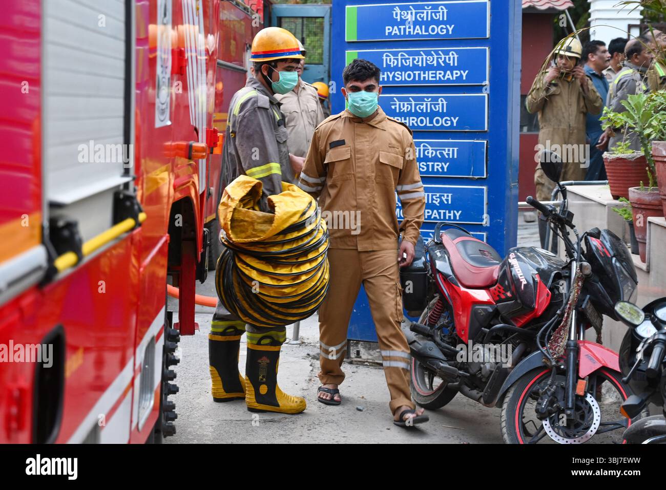 NOIDA, INDIA - JUNE 13: Firefighters worked to extinguish a blaze in the basement of Sumitra ...