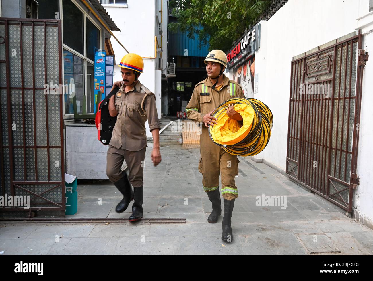 NOIDA, INDIA - JUNE 13: Firefighters worked to extinguish a blaze in the basement of Sumitra ...