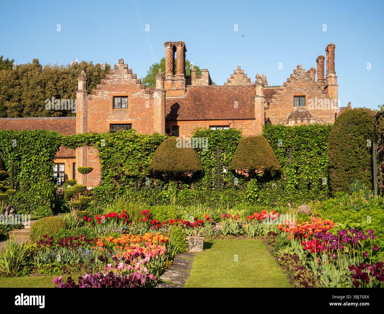 Chenies Manor house and sunken garden at tulip time Stock Photo - Alamy