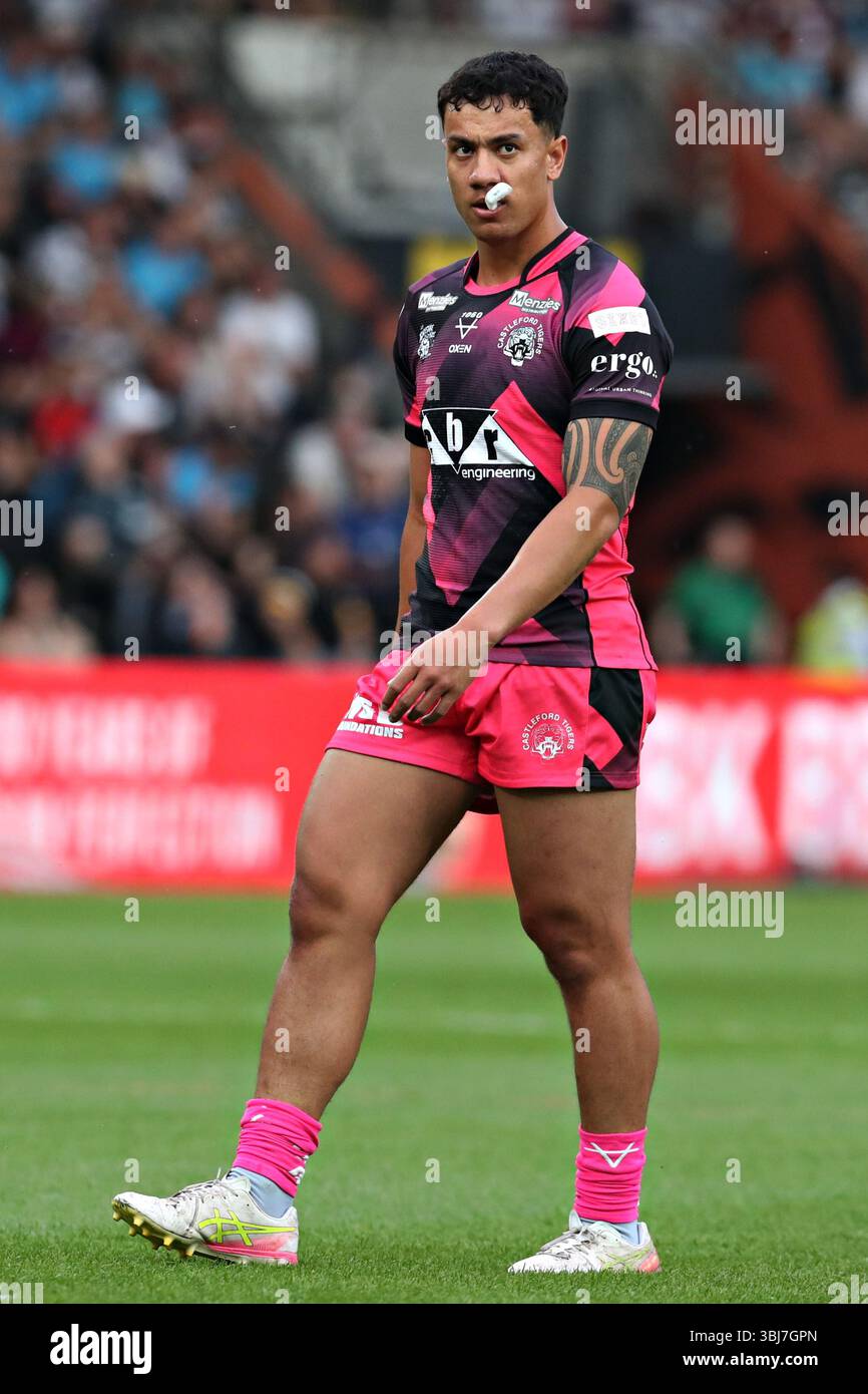 Hull, UK. 13th June, 2025. Daejarn Asi of Castleford Tigers during the ...