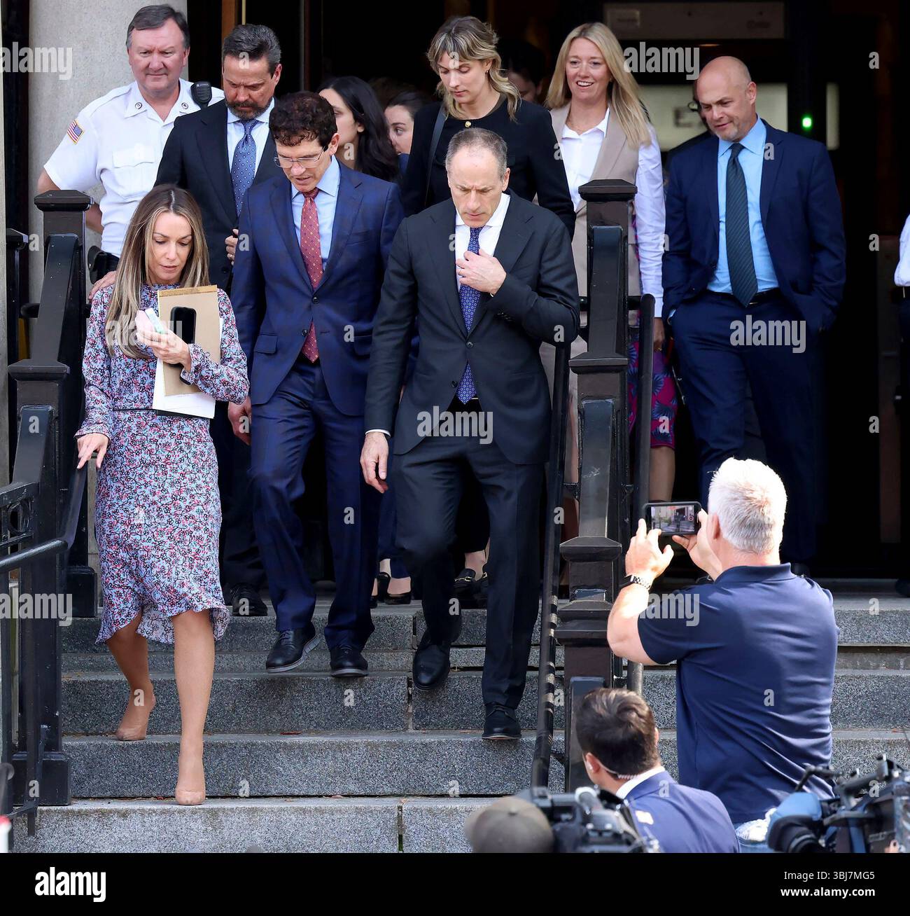 Defendant Karen Read, left, and her defense team depart from Norfolk ...