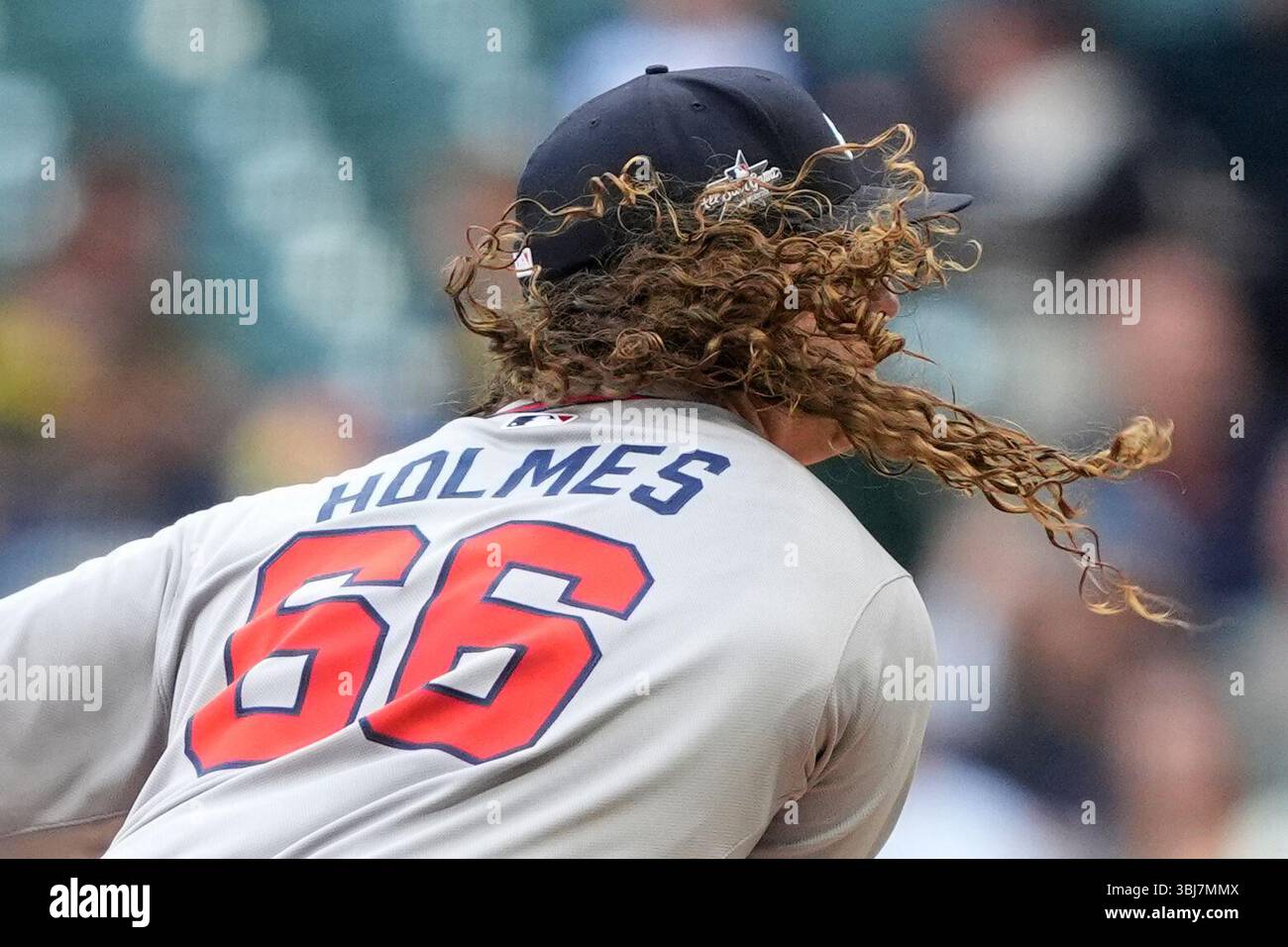 Atlanta Braves' Grant Holmes pitches during a baseball game against the ...