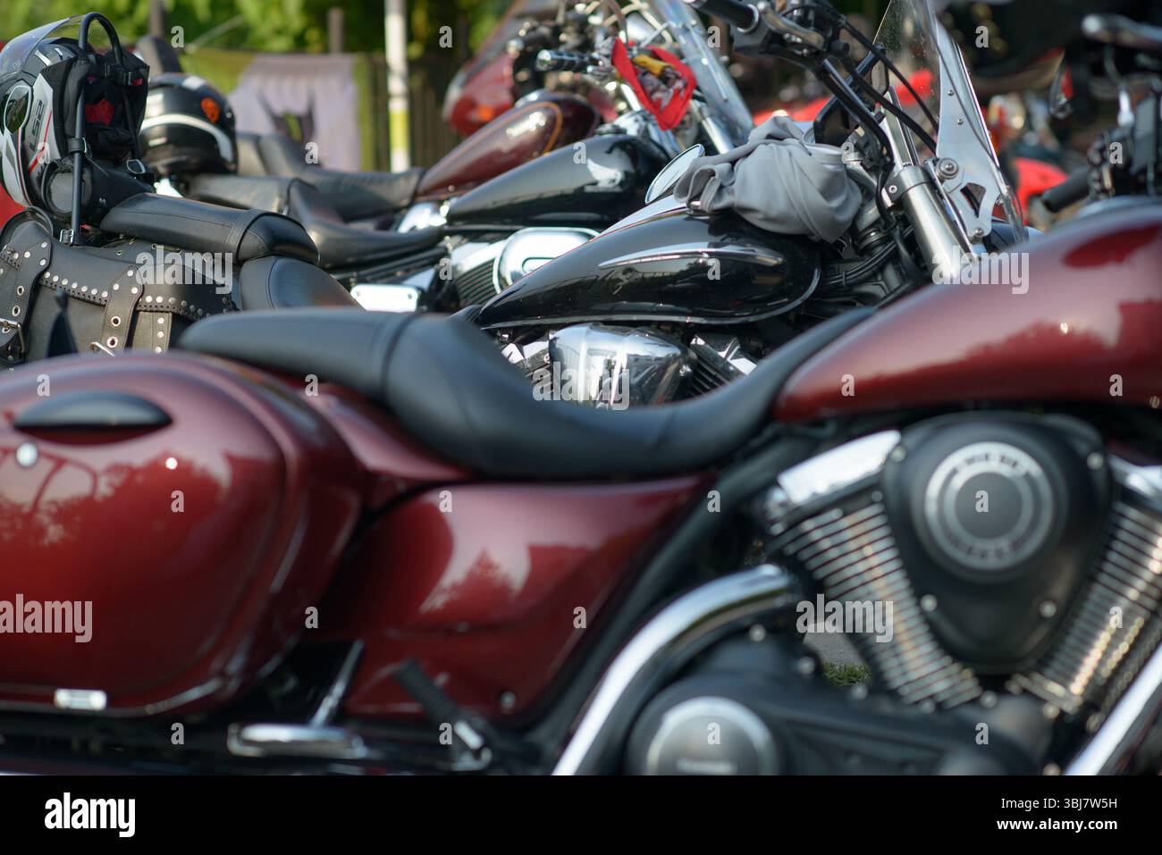 Close-up view of several parked motorcycles during the first day of ...