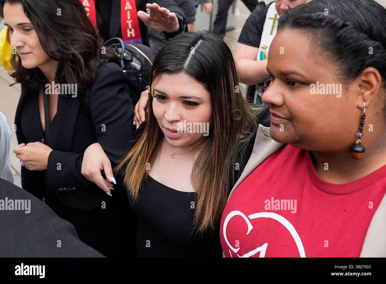 Jennifer Vasquez Sura, wife of Kilmar Abrego Garcia, center, is ...