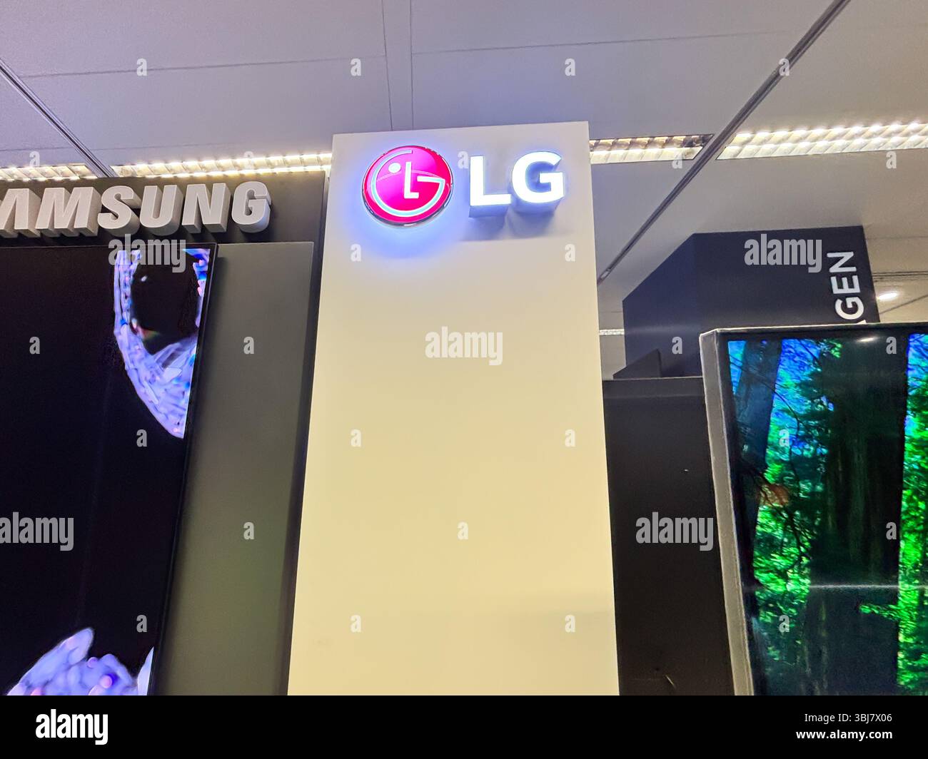 Alicante, Spain - June 11, 2025: LG logo is illuminated in a tech store ...