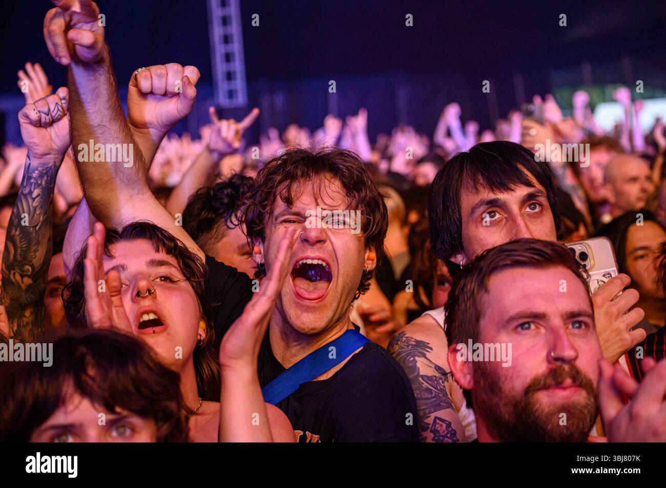 London, United Kingdom. 13th June, 2025. Fans watch Knocked Loose ...