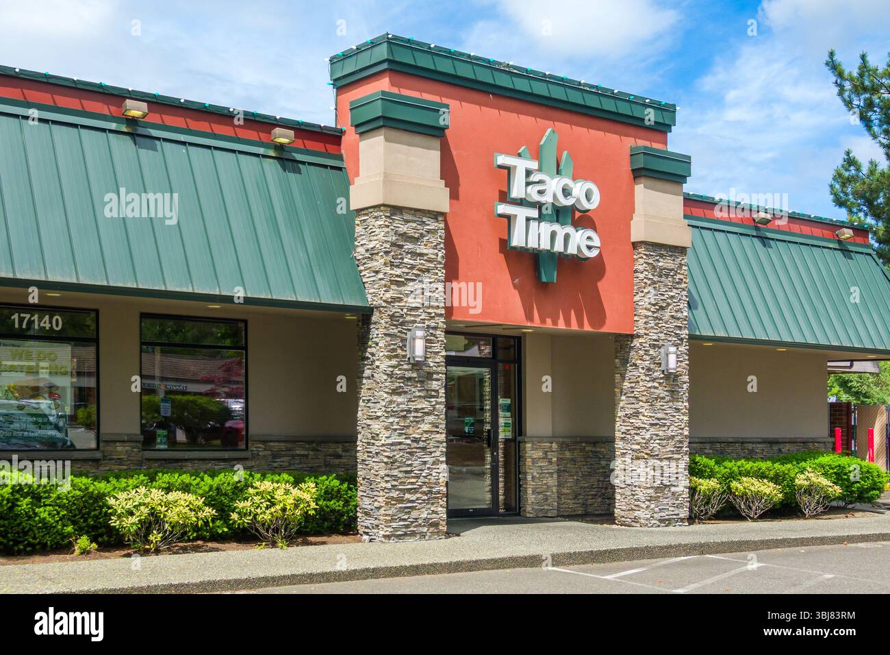 REDMOND, WA, USA, MAY 26, 2025: Taco Time fast food restaurant exterior ...
