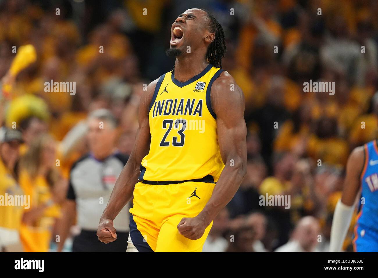 Indiana Pacers forward Aaron Nesmith reacts after a basket against the ...