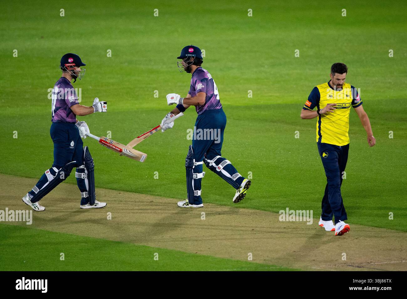 Southampton, UK, 13 June 2025. Kane Williamson (left) and Max Holden of ...