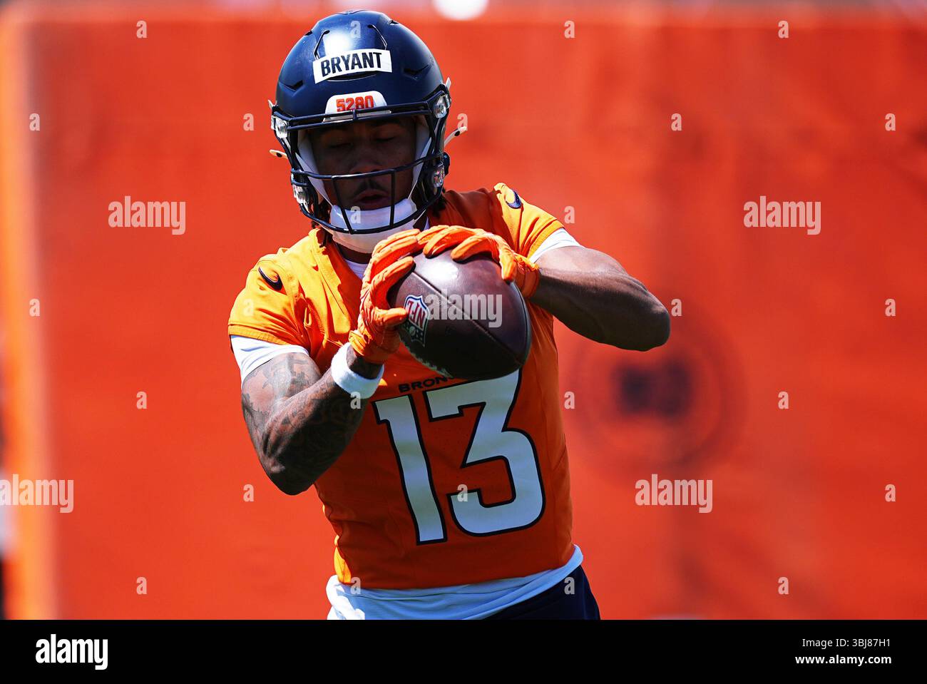 Denver Broncos wide receiver Pat Bryant (13) takes part in drills ...