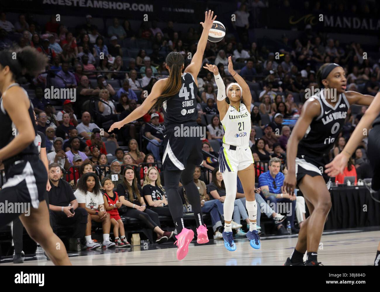 Dallas Wings guard DiJonai Carrington (21) shoots a 3-point basket over ...