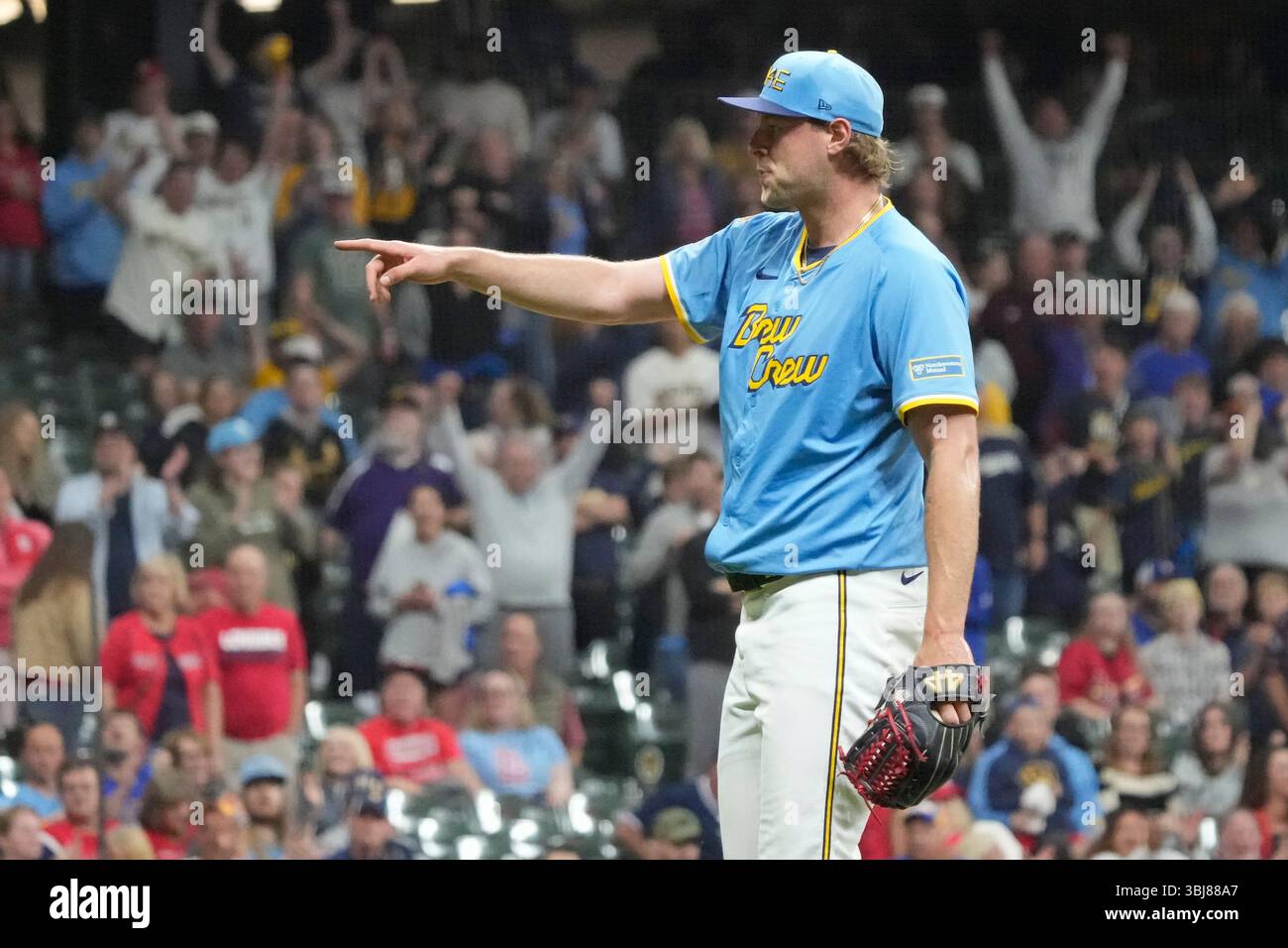 Milwaukee Brewers pitcher Trevor Megill reacts after the final out of a ...