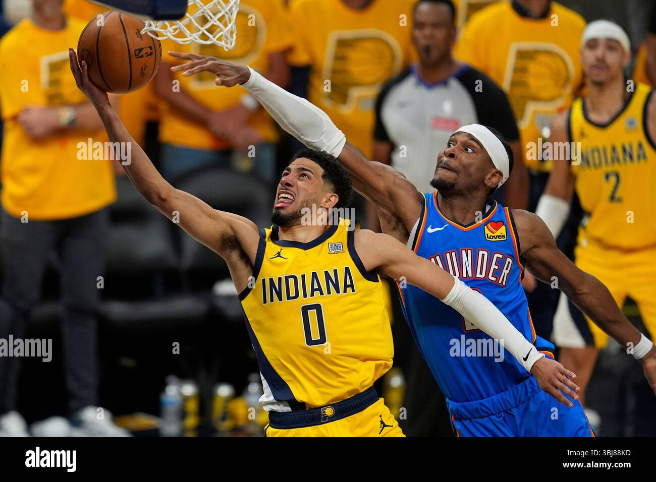 Indiana Pacers guard Tyrese Haliburton (0) shoots under Oklahoma City ...