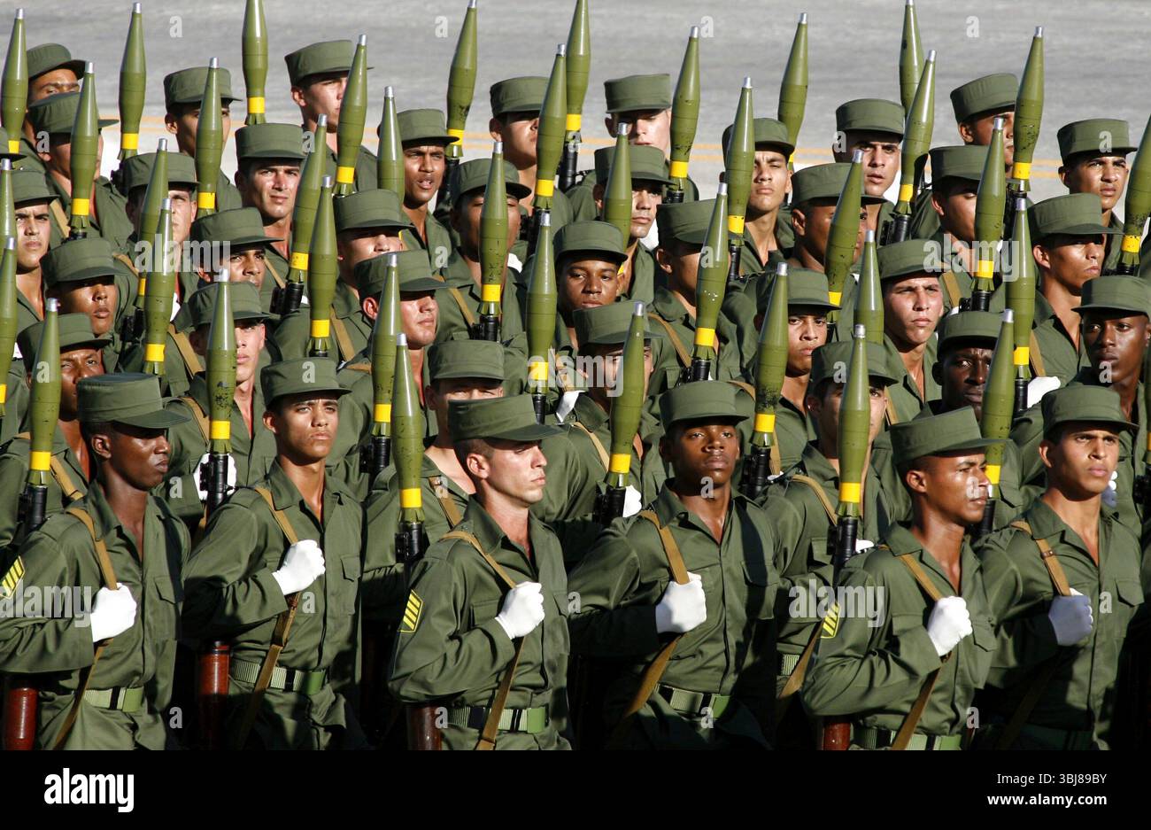 FILE - Cuban soldiers march during a military parade along the ...