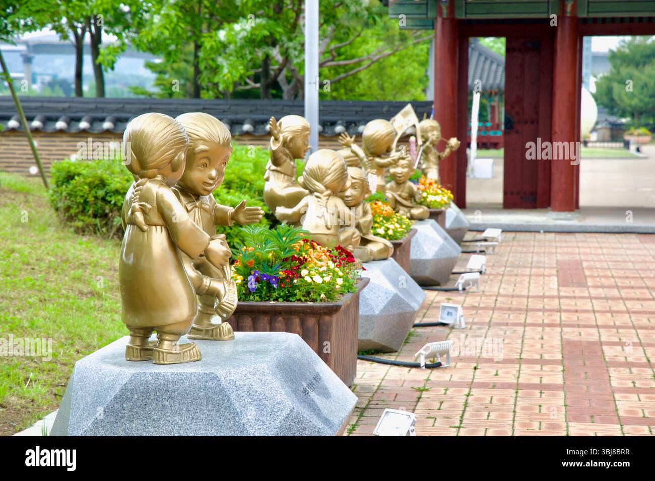 Incheon, South Korea - May 19th 2025: A row of playful bronze statues ...