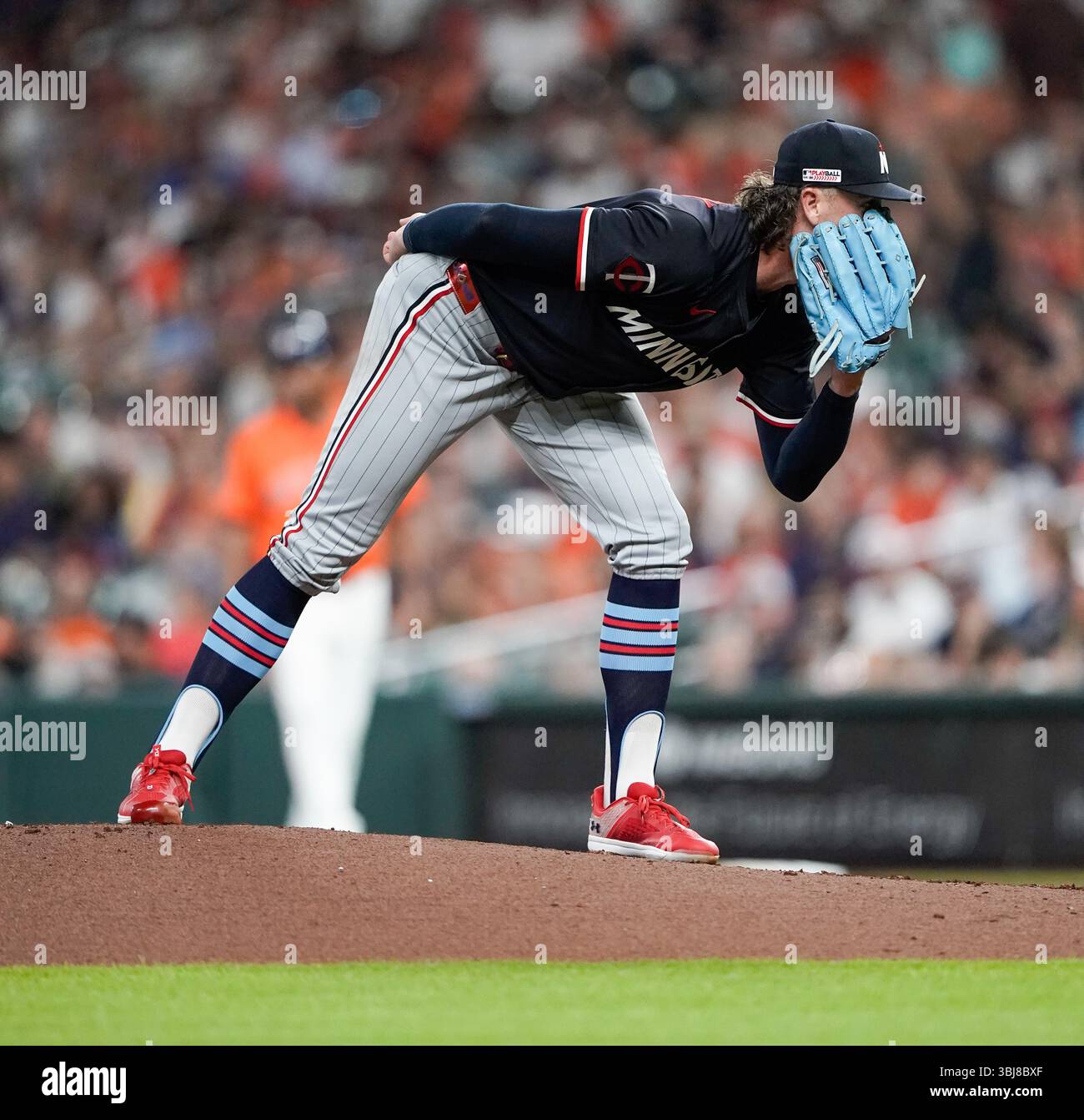 Minnesota Twins pitcher Chris Paddock (20) looks to home plate during ...
