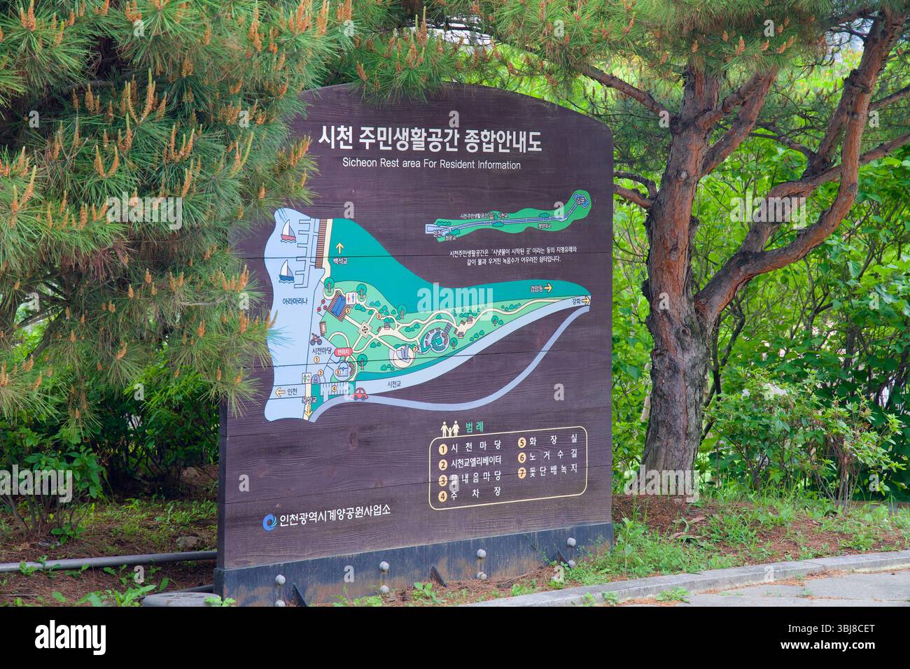 Incheon, South Korea - May 19th 2025: A wooden information board under ...