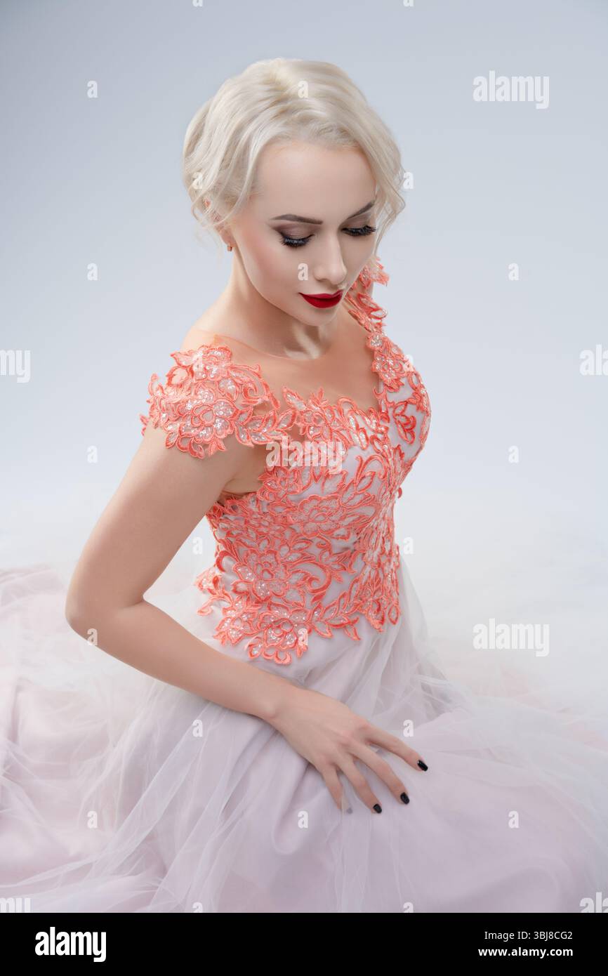 Bridal portrait with a dramatic touch of blood in a studio setting ...