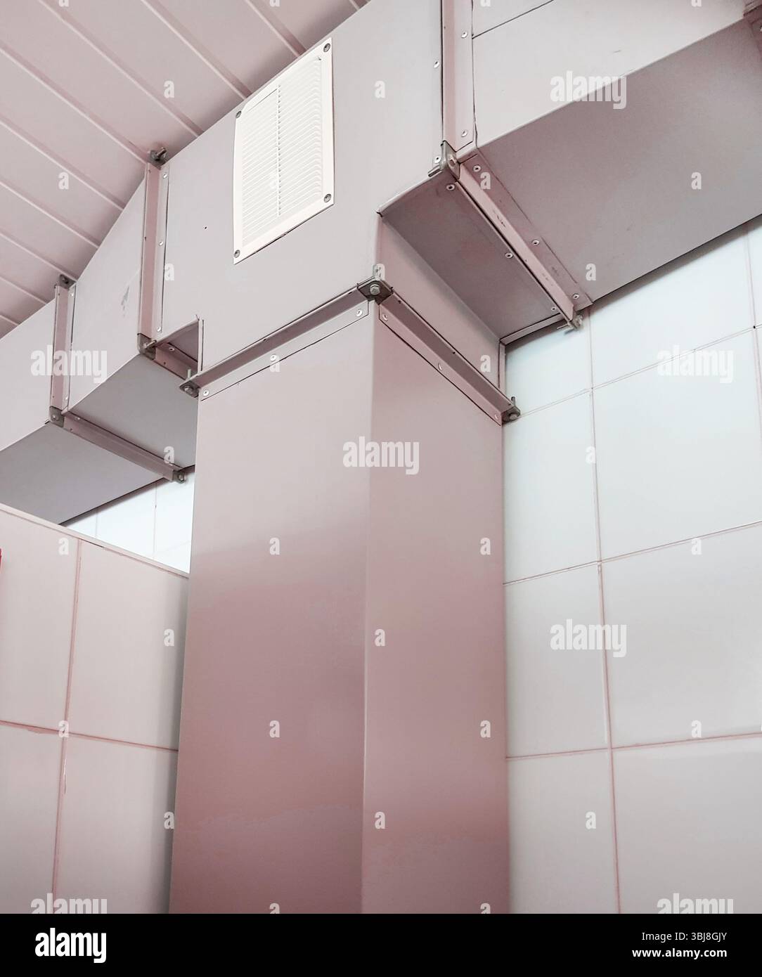 Industrial ventilation, air duct with metal box, indoors, vertical ...