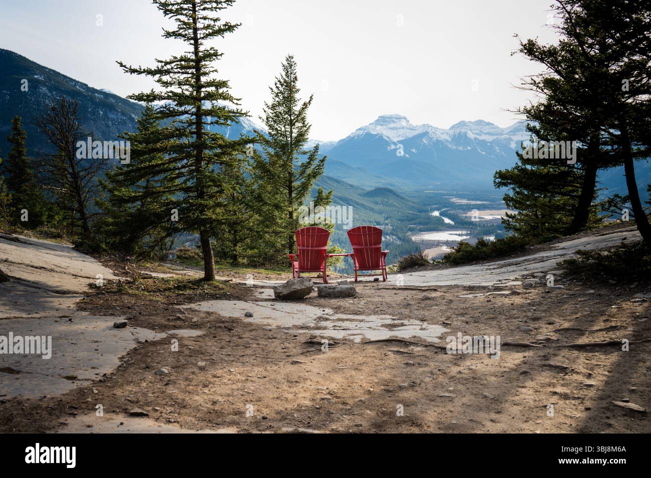 Two red chairs in Banff National Park, AB, Canada Stock Photo - Alamy