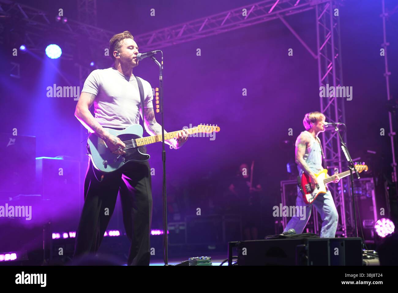 EDITORIAL USE ONLY Danny Jones and Dougie Poynter from McFly perform on ...