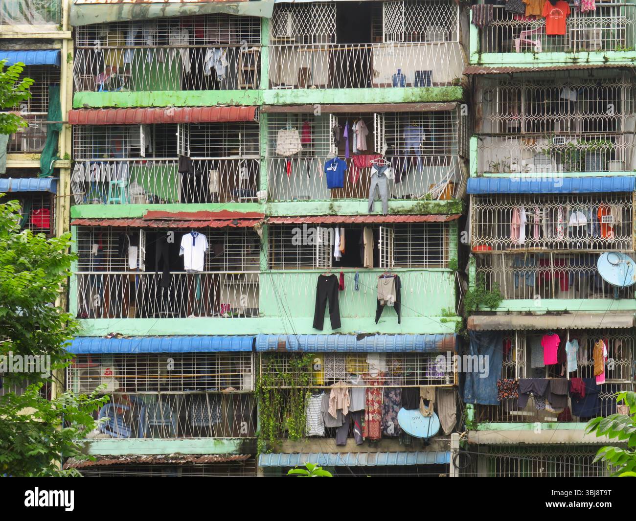 8th June 2025 - Yangon, Myanmar - Colorful Apartment buildings with ...