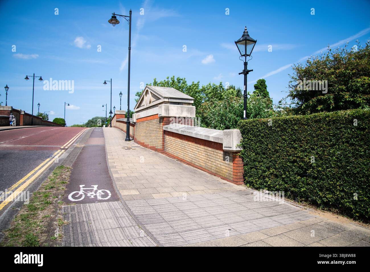 Bicycle symbol painted on pavement at the start of a cycle route near ...